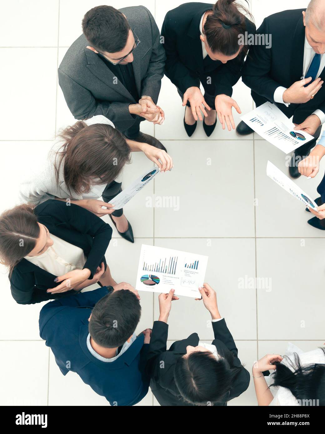 top view. group of corporate employees standing in a circle Stock Photo ...
