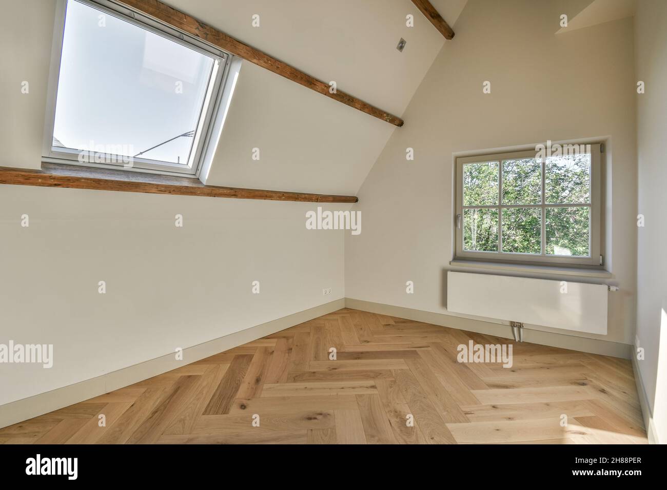 Delightful apartment with a large wooden window Stock Photo - Alamy