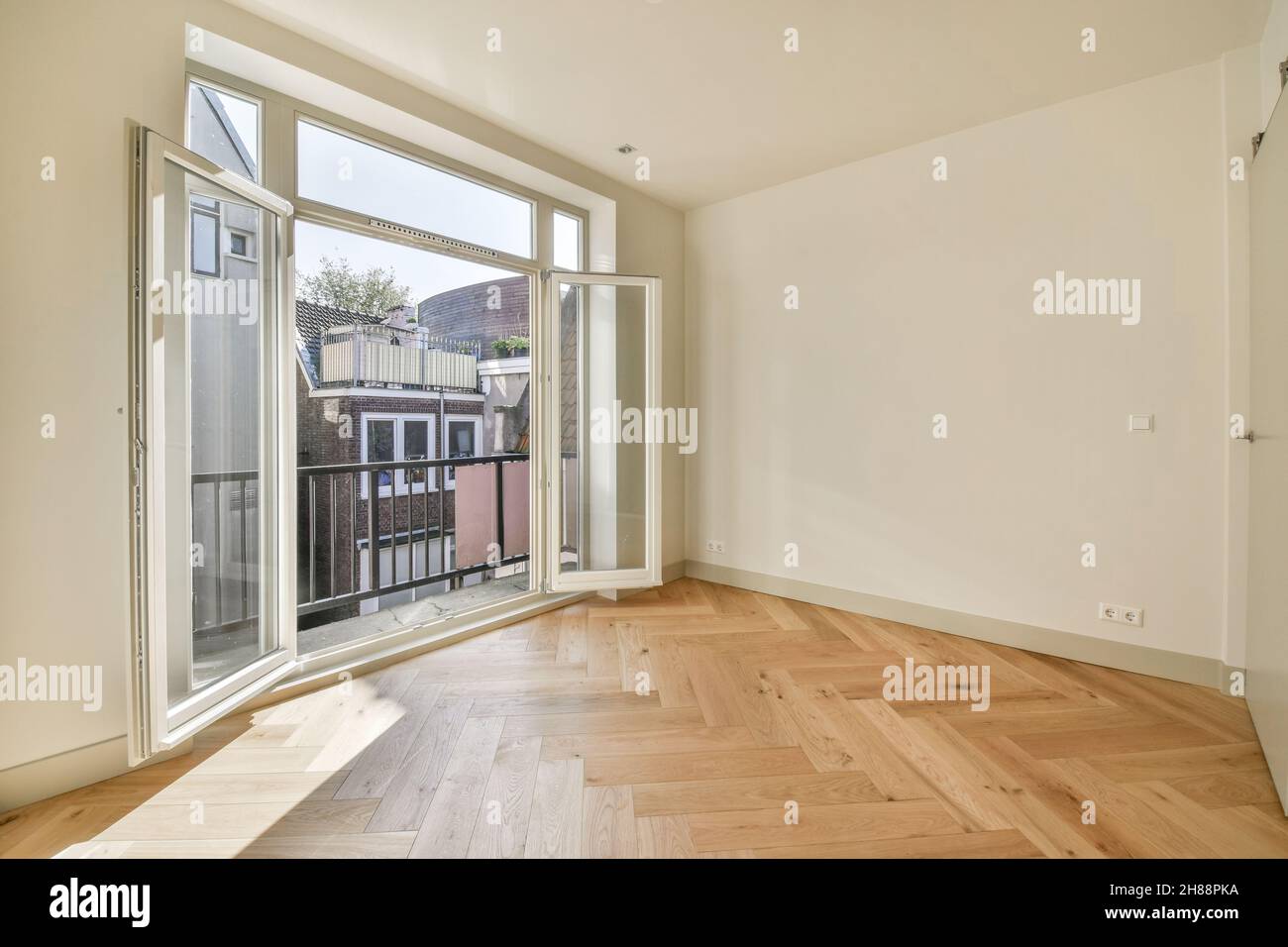 Open wide window with stunning street views Stock Photo - Alamy