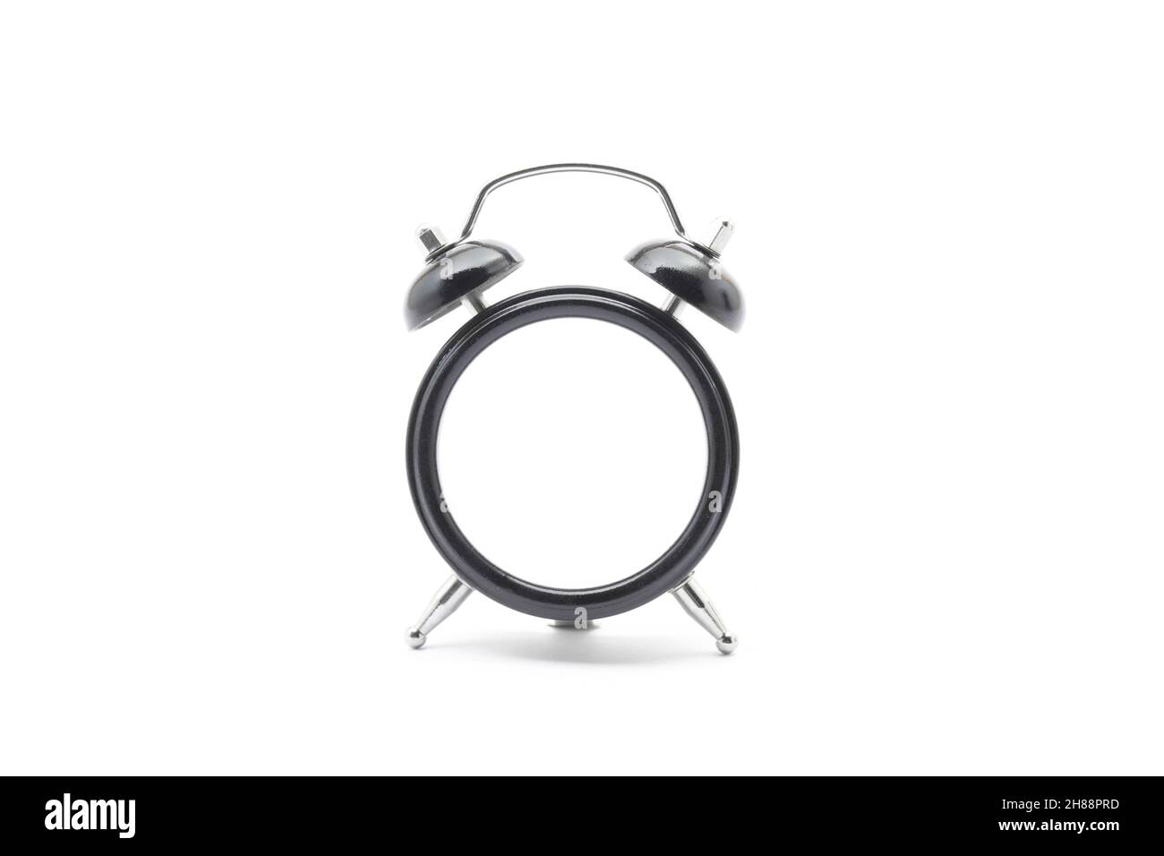 Black classic desk clock without dial on isolated white background with ...