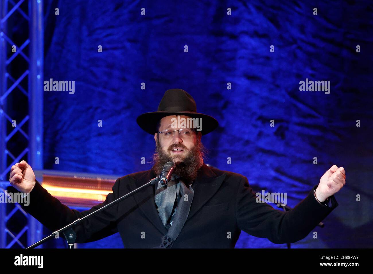 Berlin, Germany. 28th Nov, 2021. Rabbi Yehuda Teichtal speaks at the ...