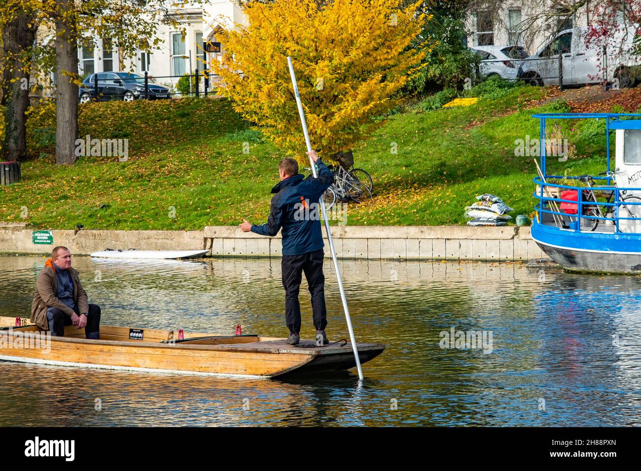 Cambridge, UK – November 18 2021. Punting lessons on the River Cam on a ...