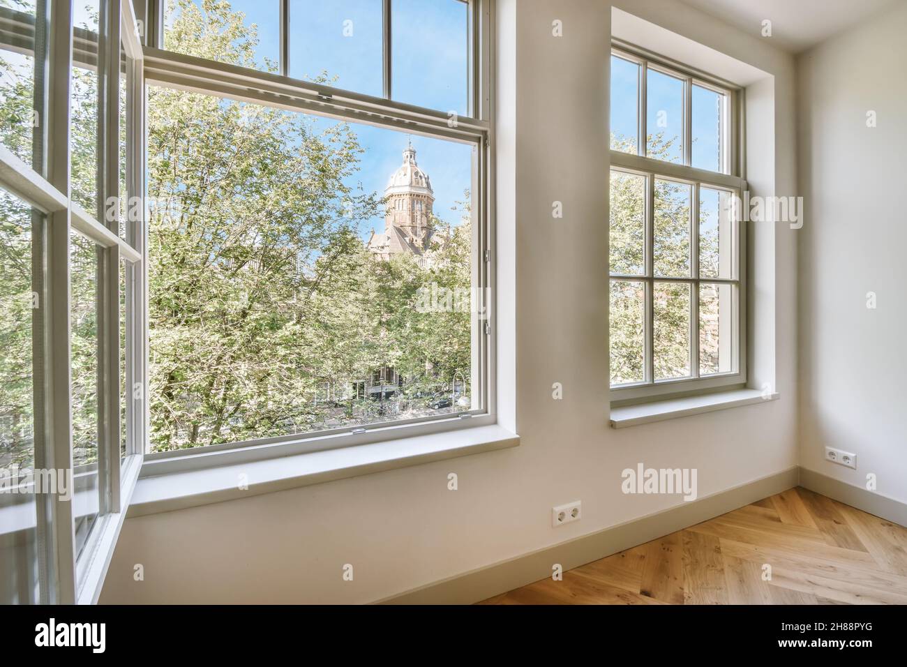 Open wide window with stunning street views Stock Photo - Alamy