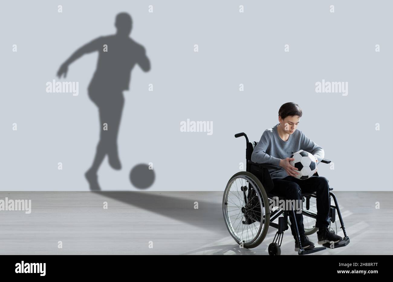 Shape of football player behind handicapped teen guy, conceptual image ...