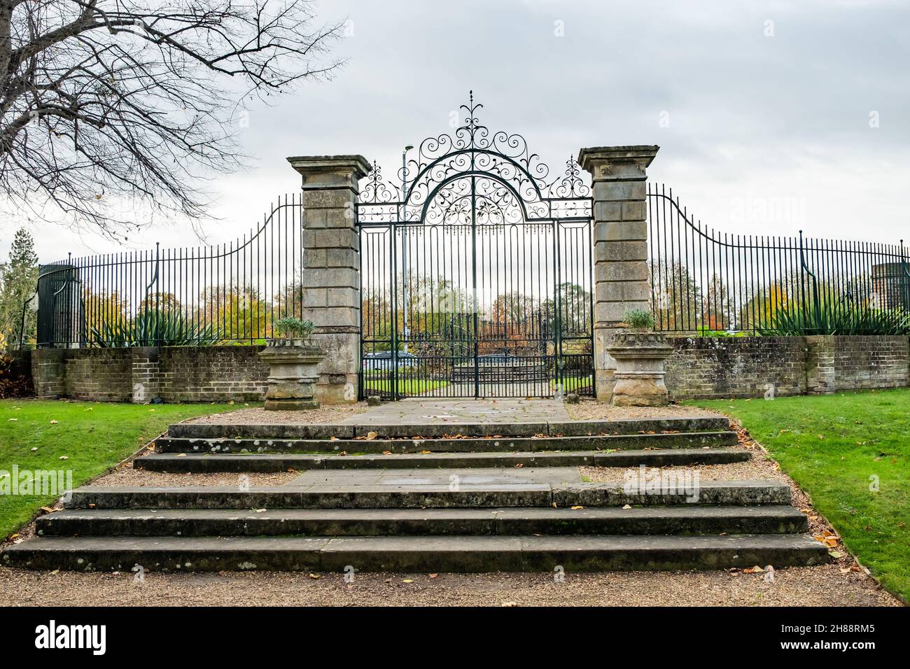 Ornate and decorative entrance gate to Cambridge Botanical Gardens in ...