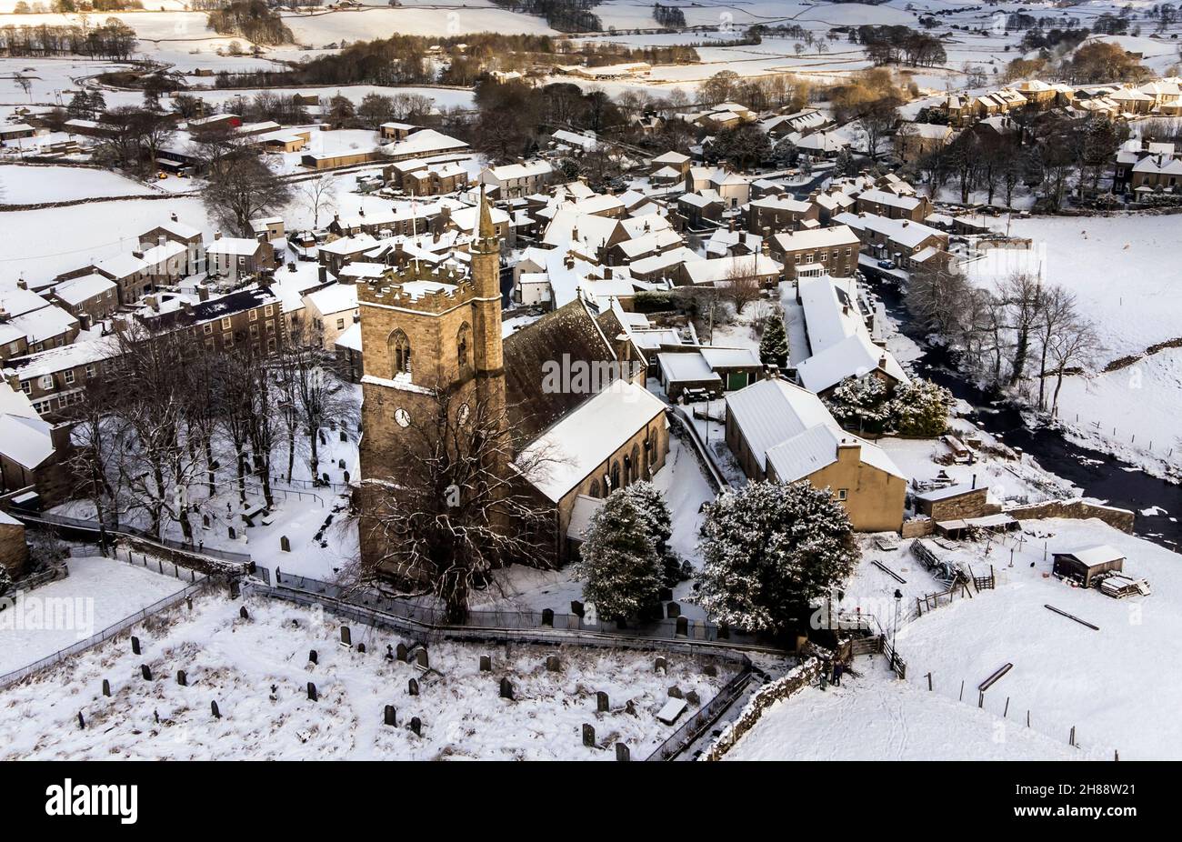 St Margaret's Church in Hawes, North Yorkshire, is surrounded by snow ...