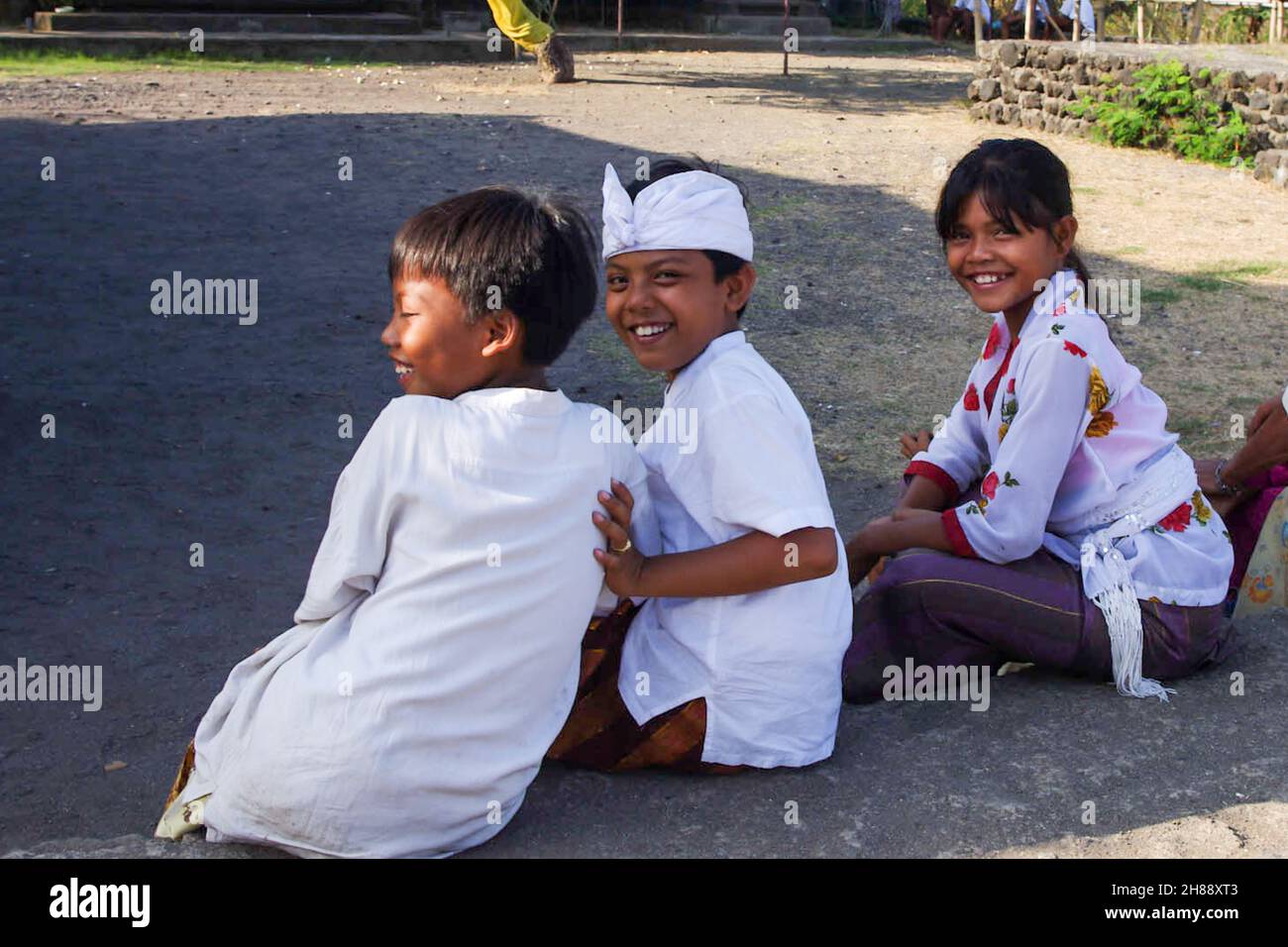 Happy Asian and smiling kids (two boys and one girl) they wearing ...