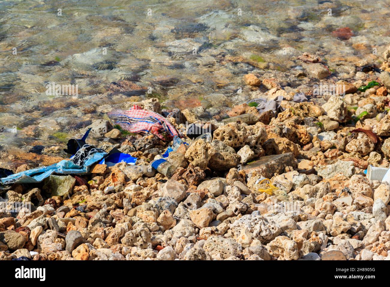 Garbage on a bank of ocean. Pollution of sea, ocean water with waste ...