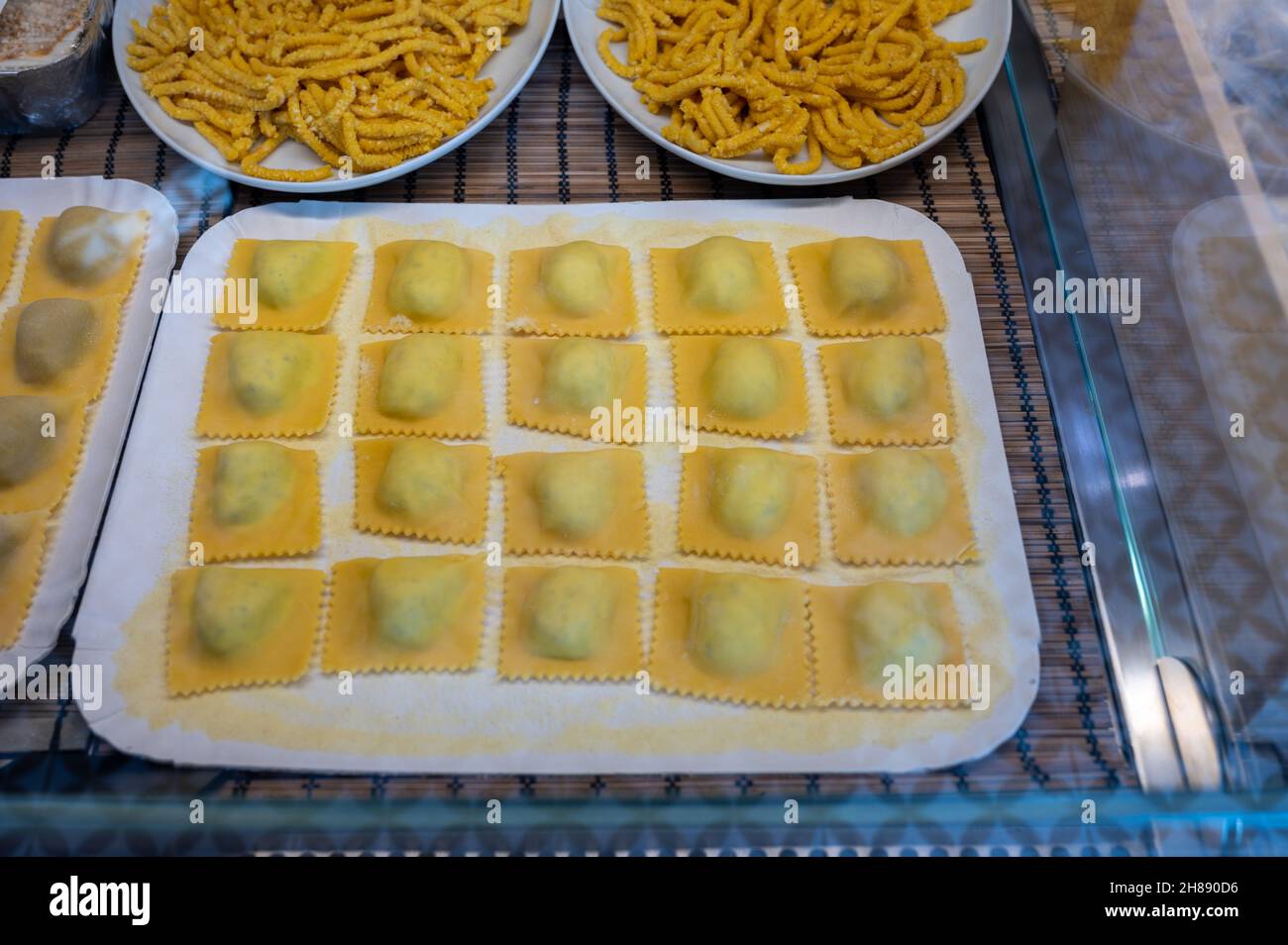Italian food, fresh home made stuffed pasta tortelli or ravioli ...