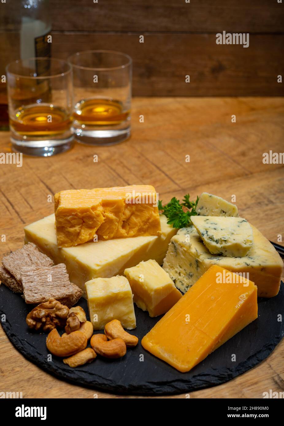 British drinks and food pairing, glasses of Scotch whisky and cheeses ...