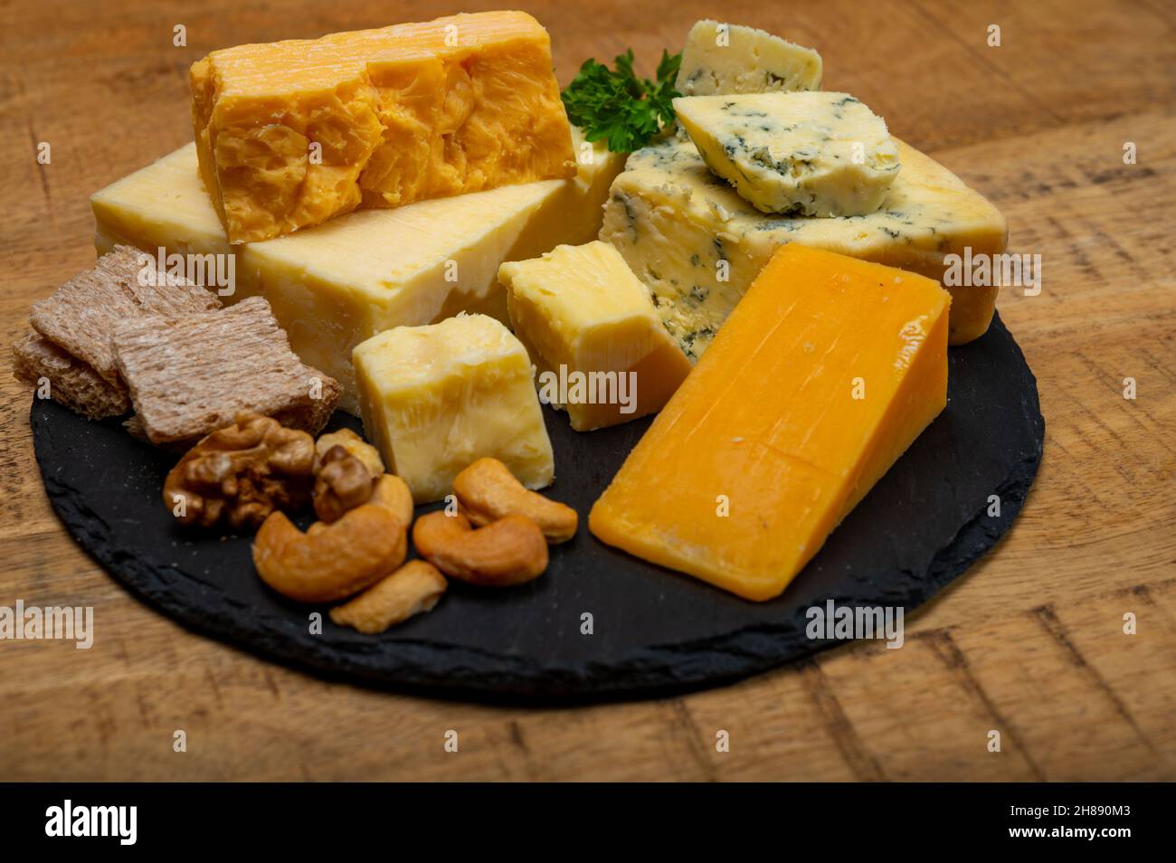 British cheeses collection, blue Stilton, Scottish coloured and English ...