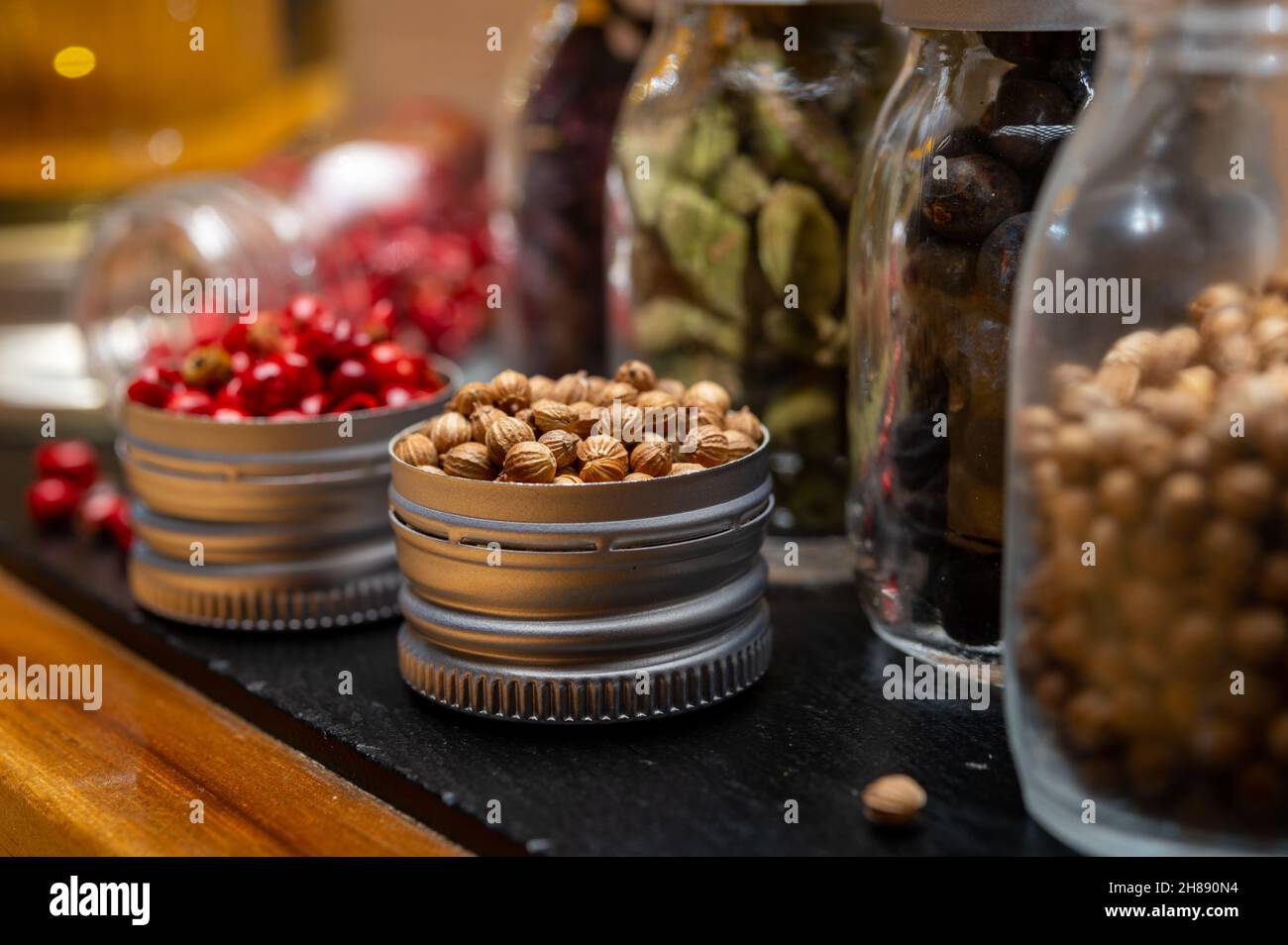 Professional set of gin spices in small bottles, pink pepper, hibiscus ...