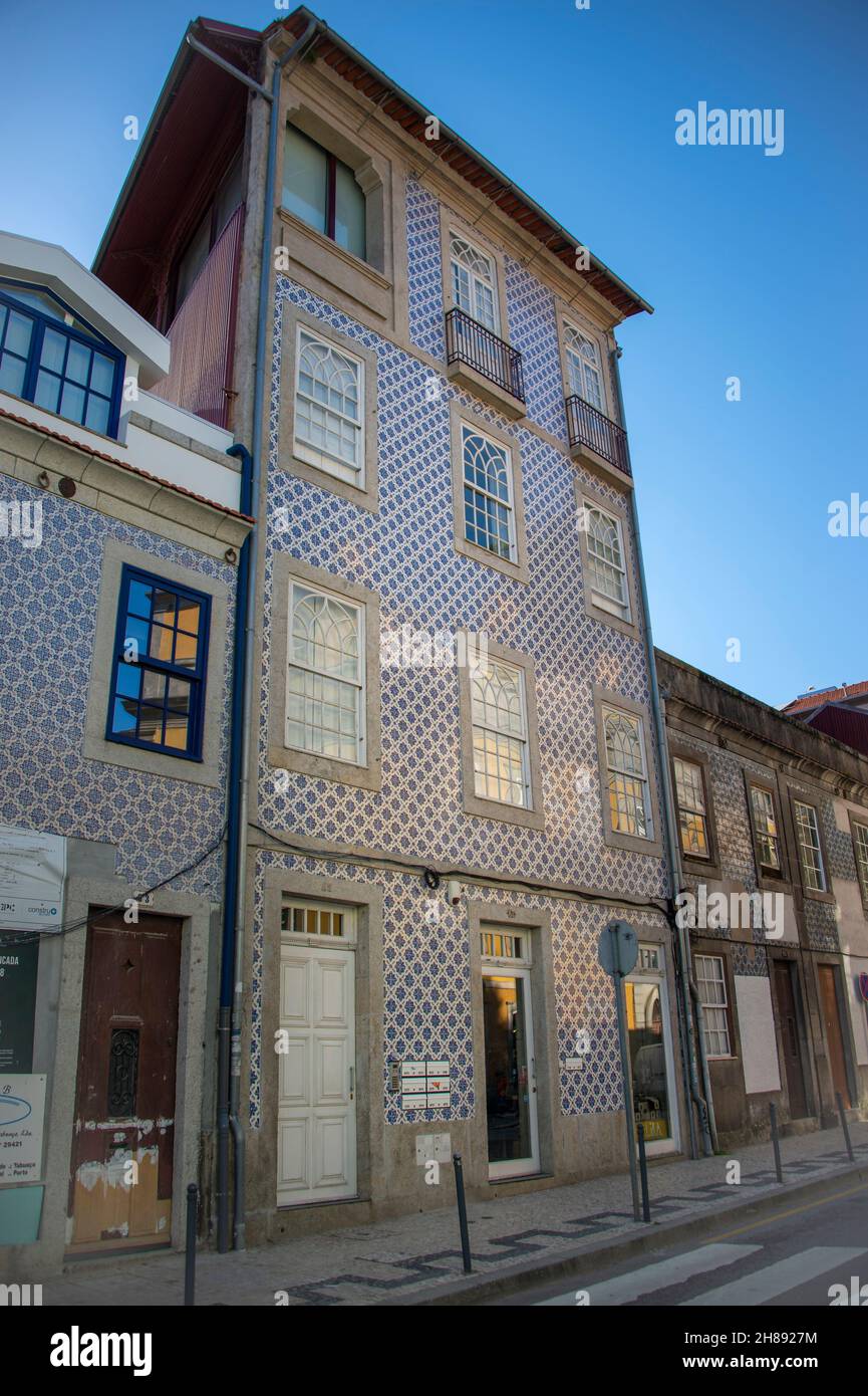 Building facade in Porto`s old town with the typical blue Azulejo ...
