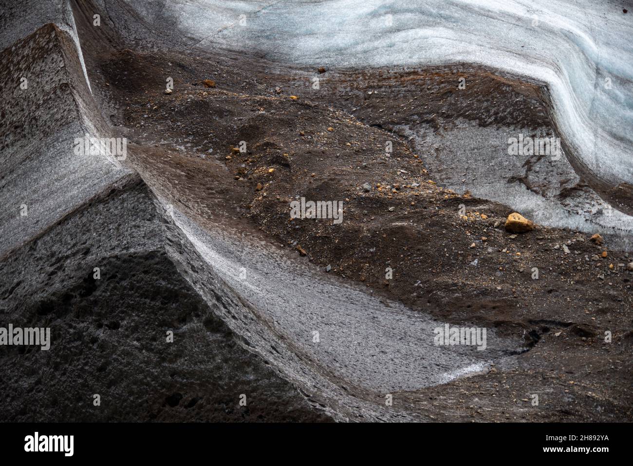 Ash mixed in with glacial Ice, iceland Stock Photo - Alamy