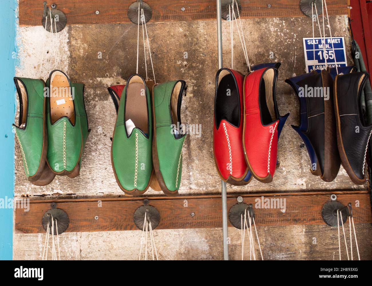 Set of traditional hand made shoes in various colors Stock Photo - Alamy