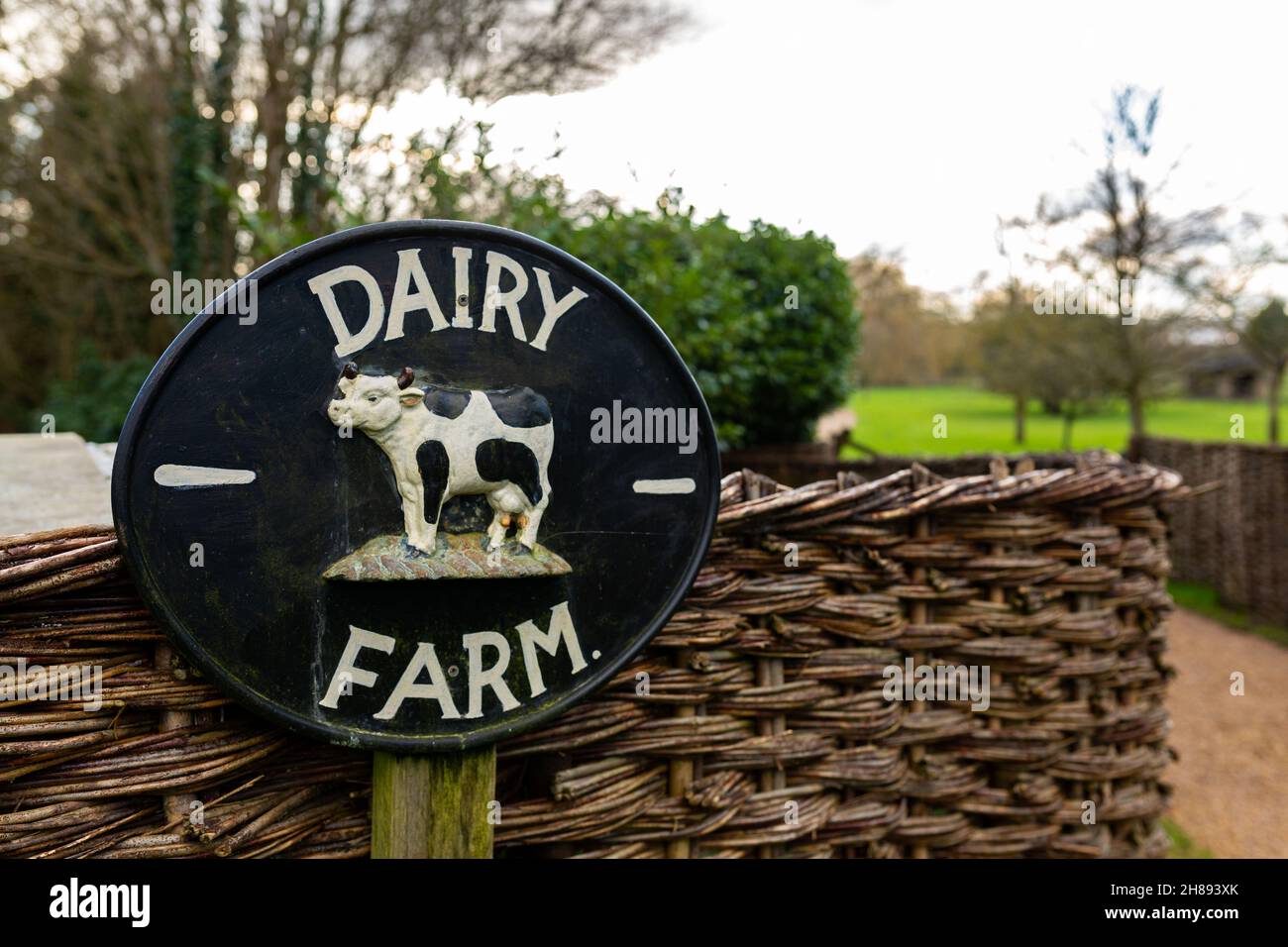A traditional cast iron sign for a dairy farm Stock Photo - Alamy