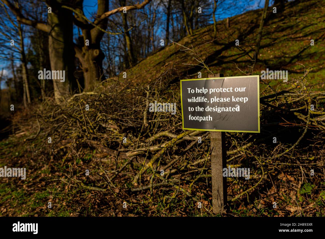 'To help protect our wildlife, please keep to designated footpath' sign ...