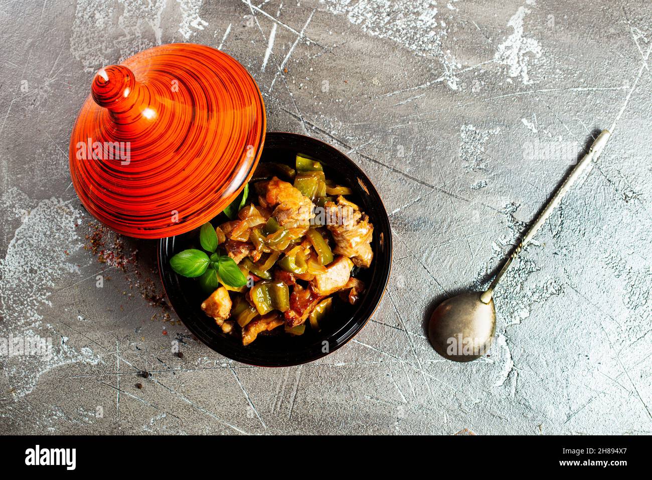 meat stew with vegetables in tajin Stock Photo - Alamy