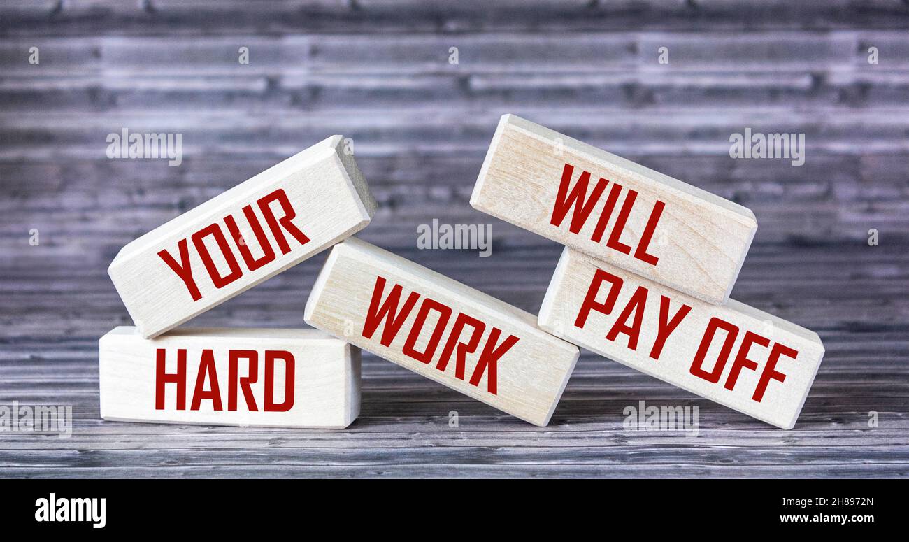 Your hard work will pay off inspirational text on wood block and wood ...