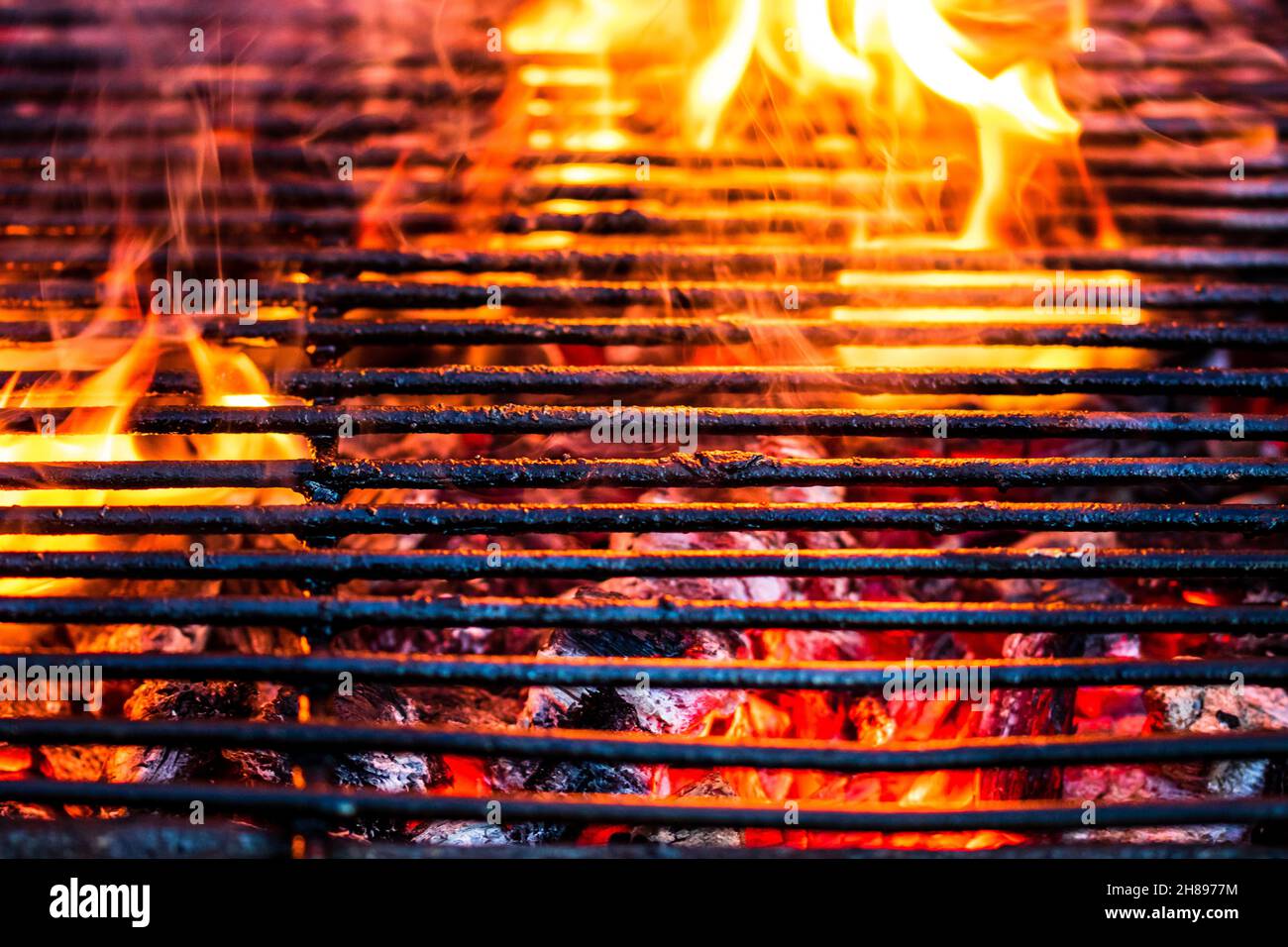 Empty hot charcoal barbecue grill with bright flame Stock Photo - Alamy