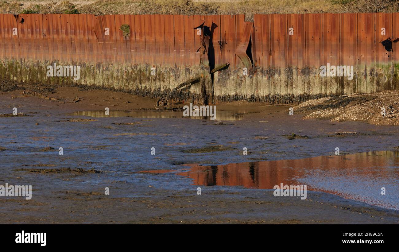 Old rusted metal structures seen in Pagham Harbour Nature Reserve as ...