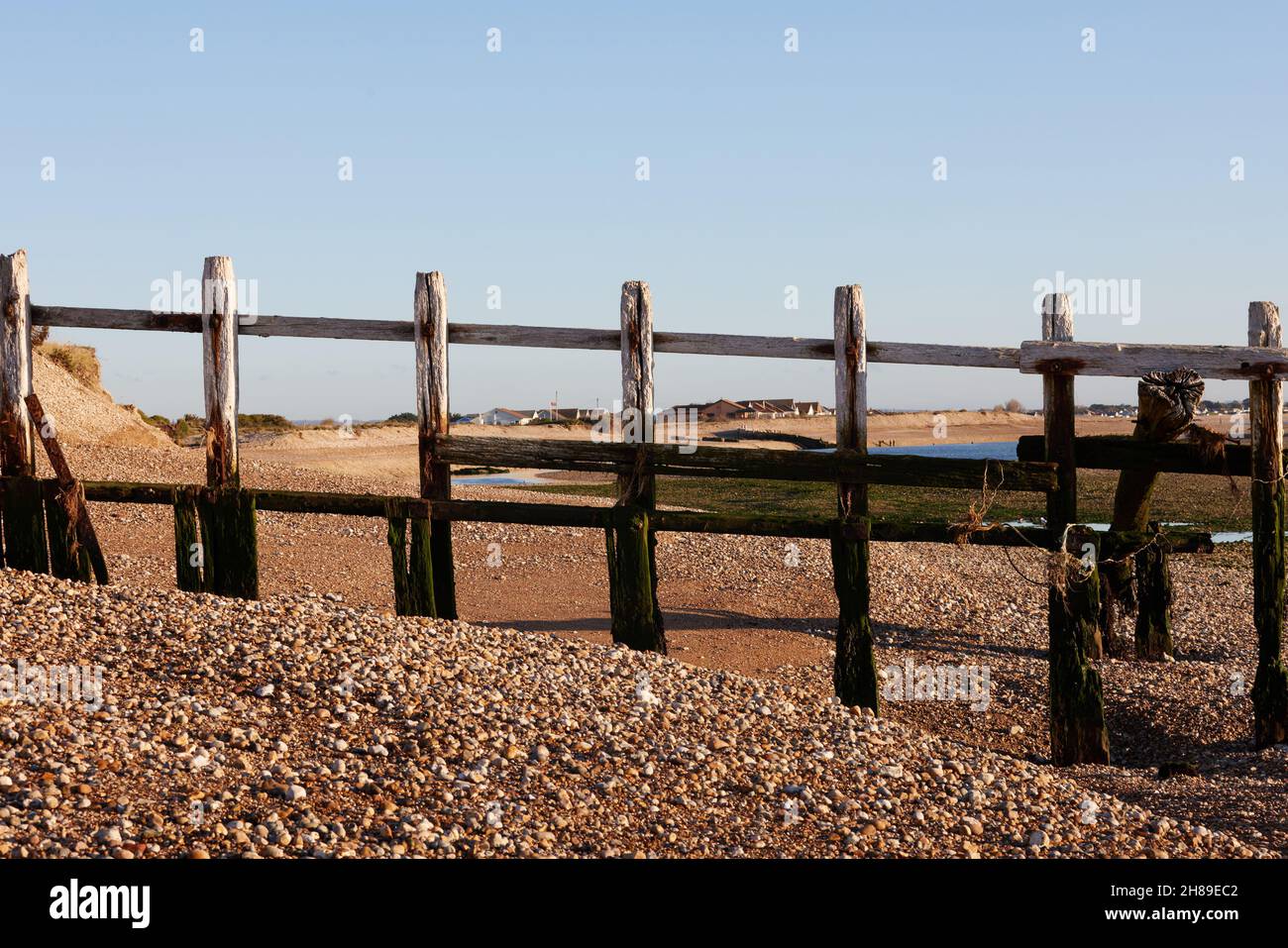 Old wooden structures seen in Pagham Harbour Nature Reserve as remnants ...