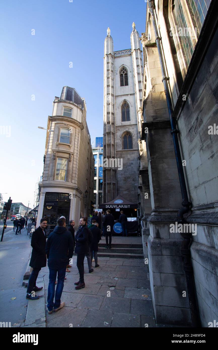 City workers queue at restaurant for lunch in Queen Victoria Street ...