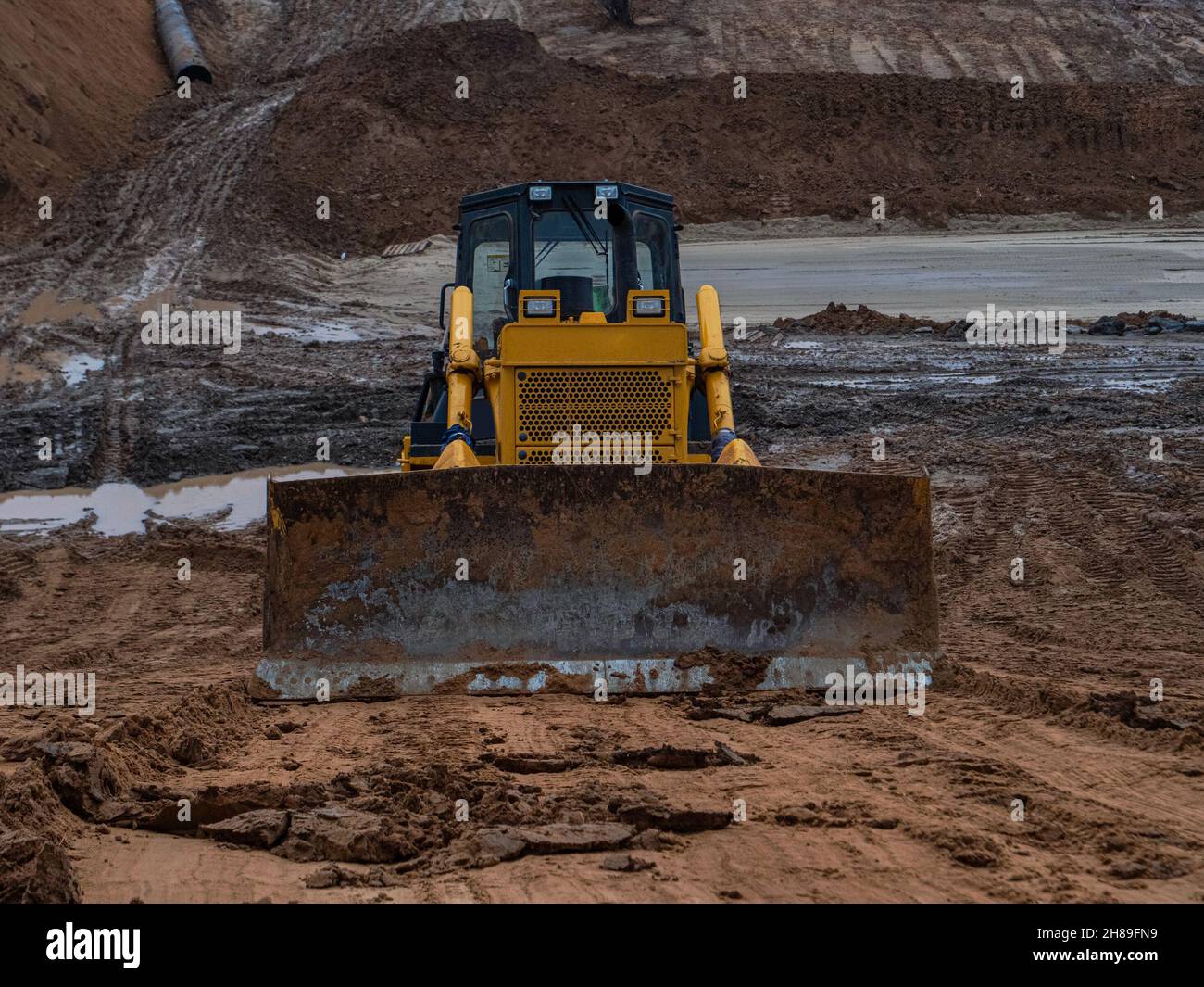 Bulldozer on the construction of a new road. Bulldozer close up ...