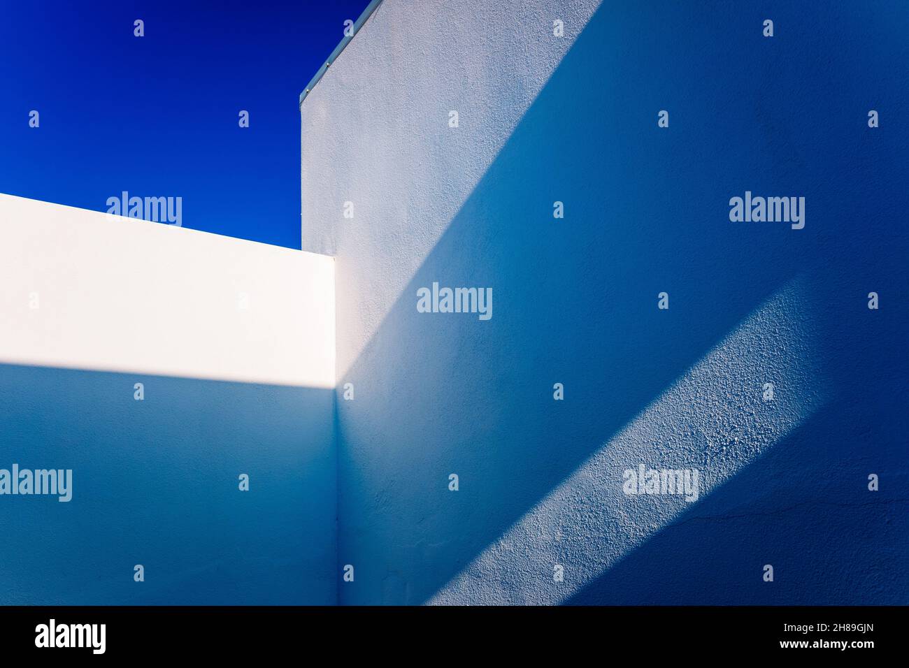 White walls geometric angled shapes of simple and clean design in sunny ...