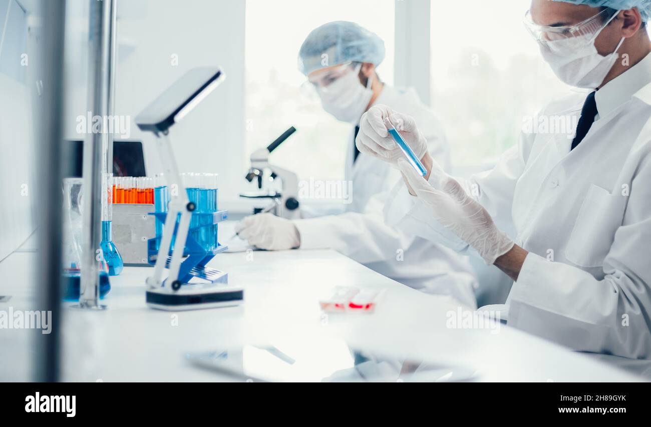 background image scientists are conducting research in the laboratory ...