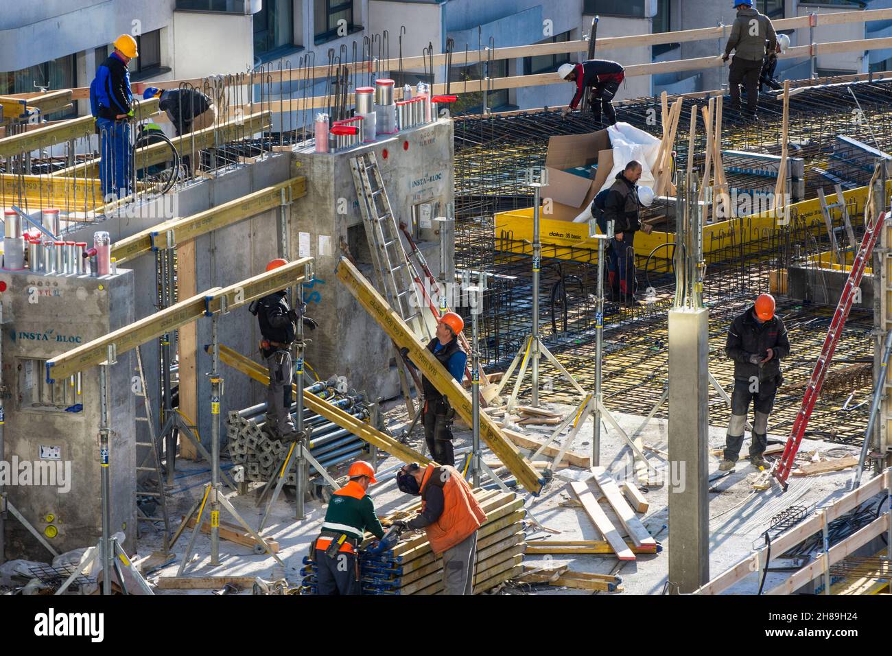 Wien, Vienna: construction site, construction worker with ceiling ...