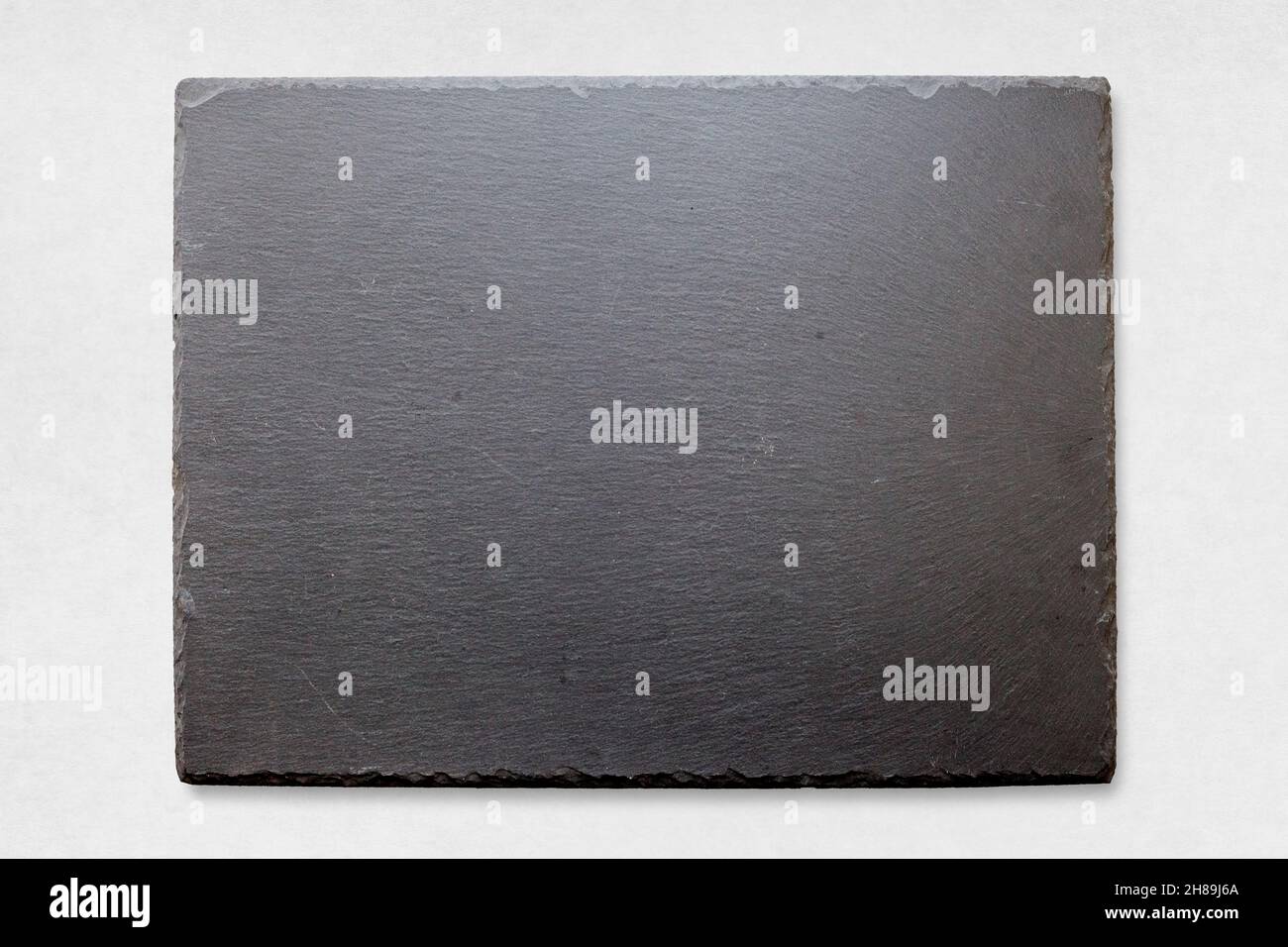 Slate tray on a white surface perfect to use for layout montage Stock ...