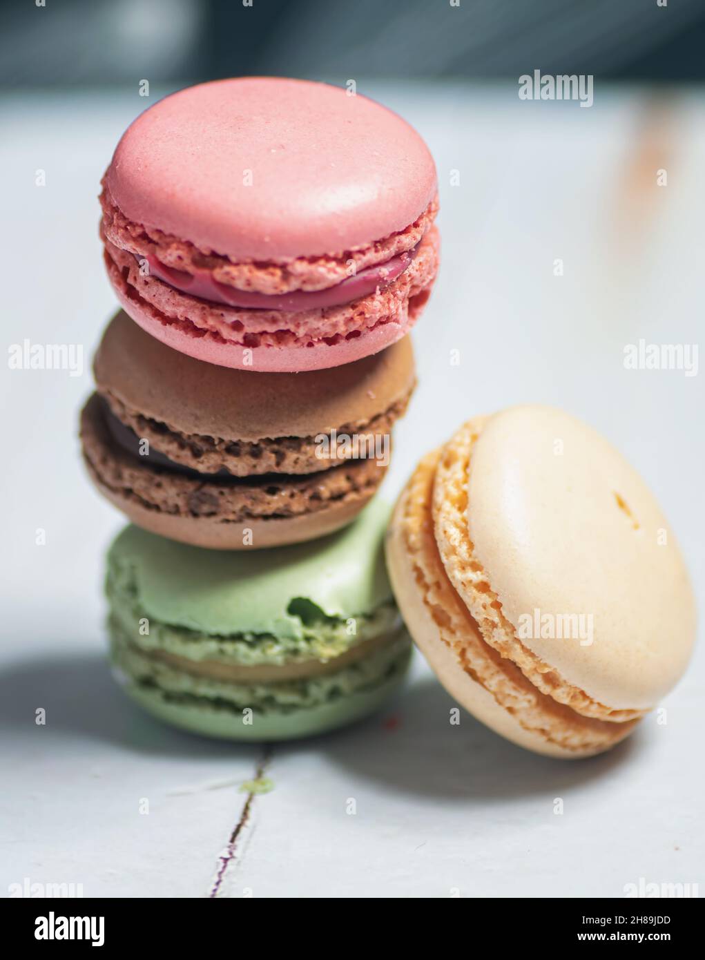 Colourful macaroons stacked on top of each other Stock Photo - Alamy