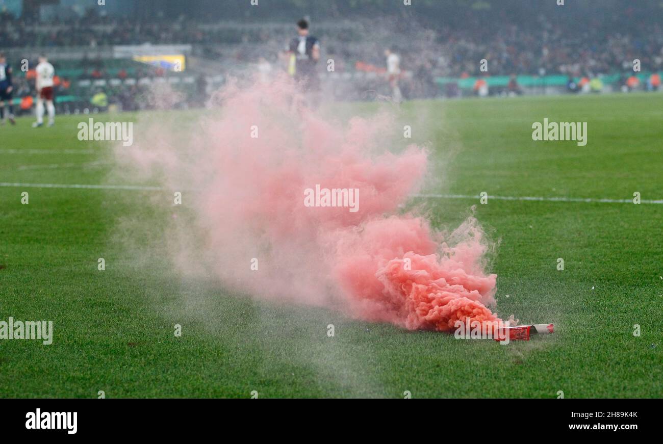 Smoke bomb on football pitch hi-res stock photography and images - Alamy