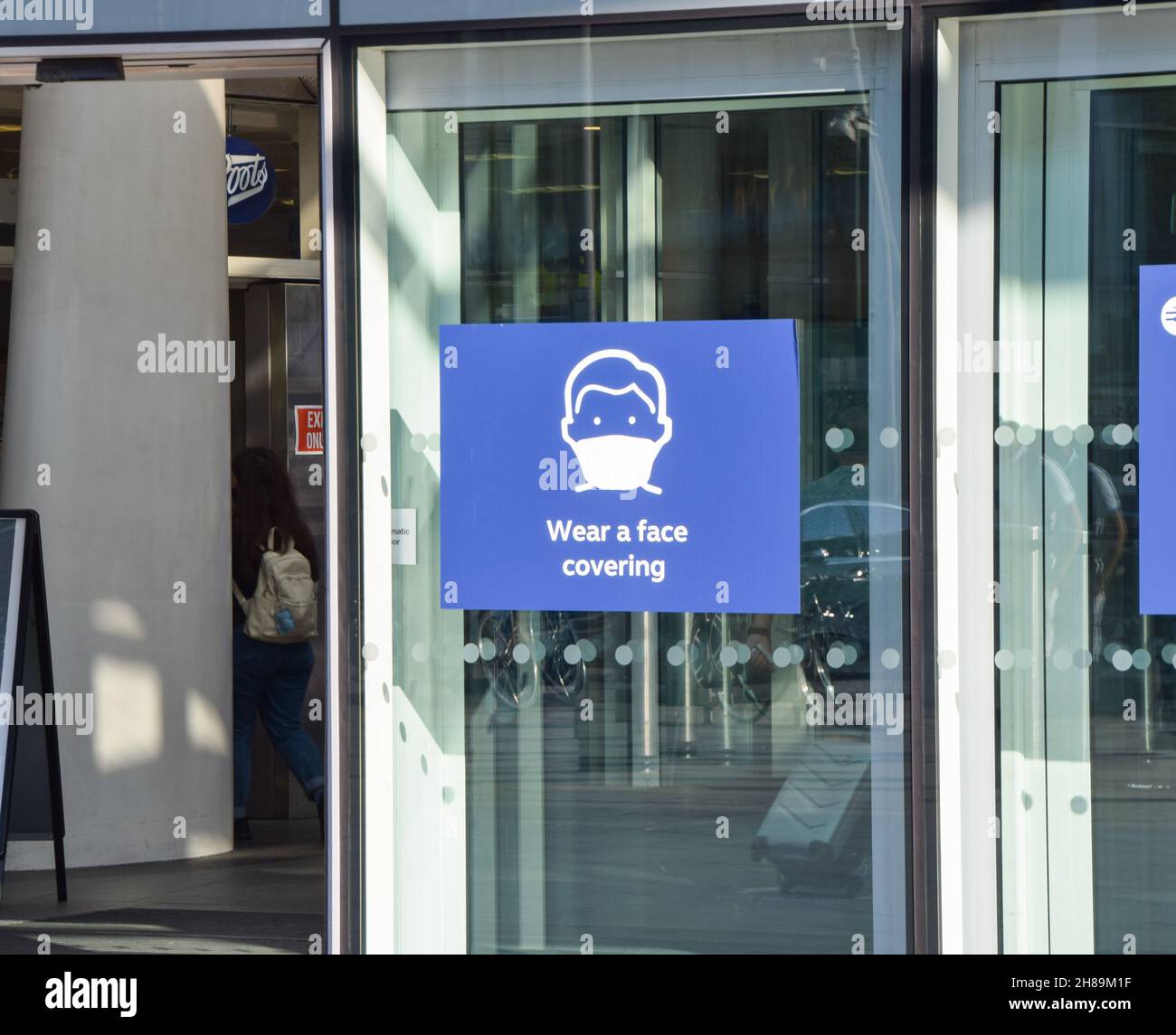 Wear A Face Covering sign at King's Cross station, London, UK 21 ...