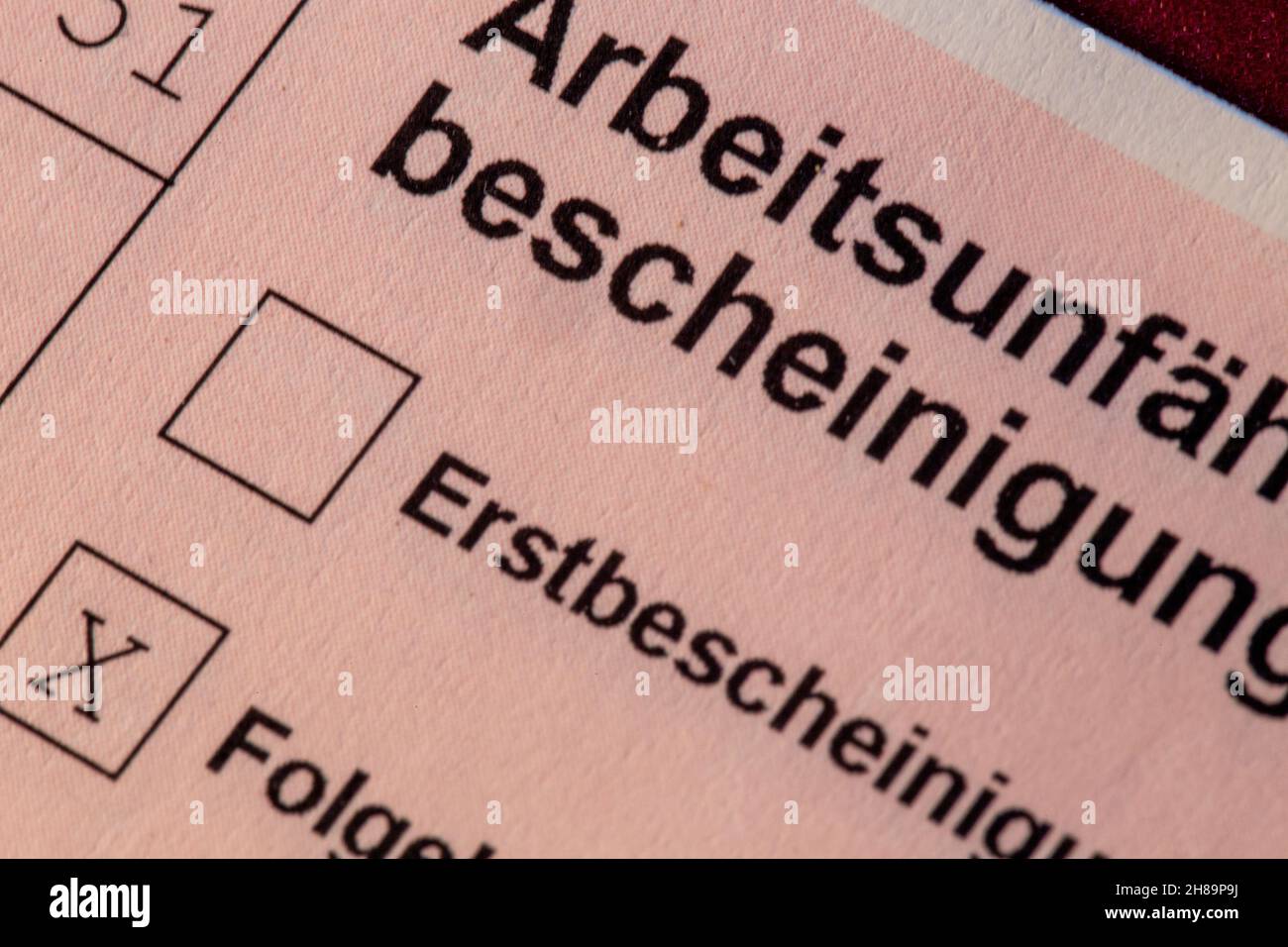 Symbolic image: Close-up of a certificate of incapacity for work ...