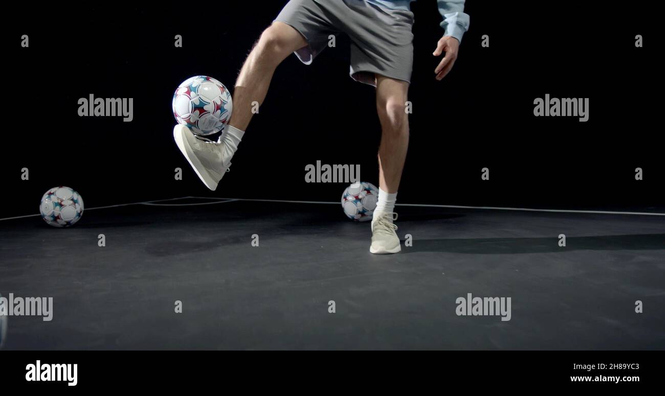 A studio photo of a man who is playing football Stock Photo - Alamy