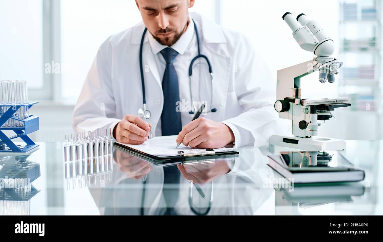 close-up. scientist conducts research in a clinical laboratory Stock ...