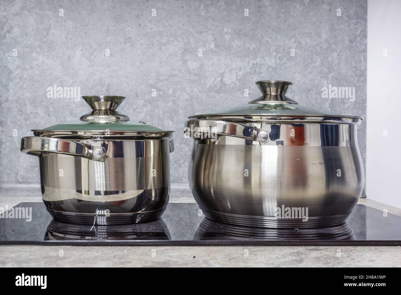 Cooking pots on induction hi-res stock photography and images - Alamy