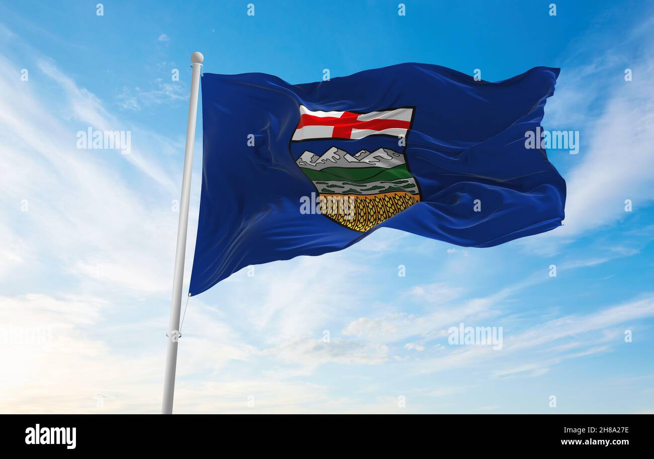 flag of Alberta , Canada at cloudy sky background on sunset, panoramic ...