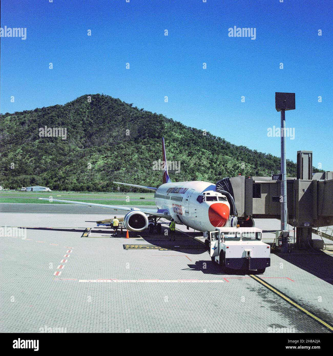 Virgin Blue passenger jet at Cairns Airport, Queensland, Australia ...