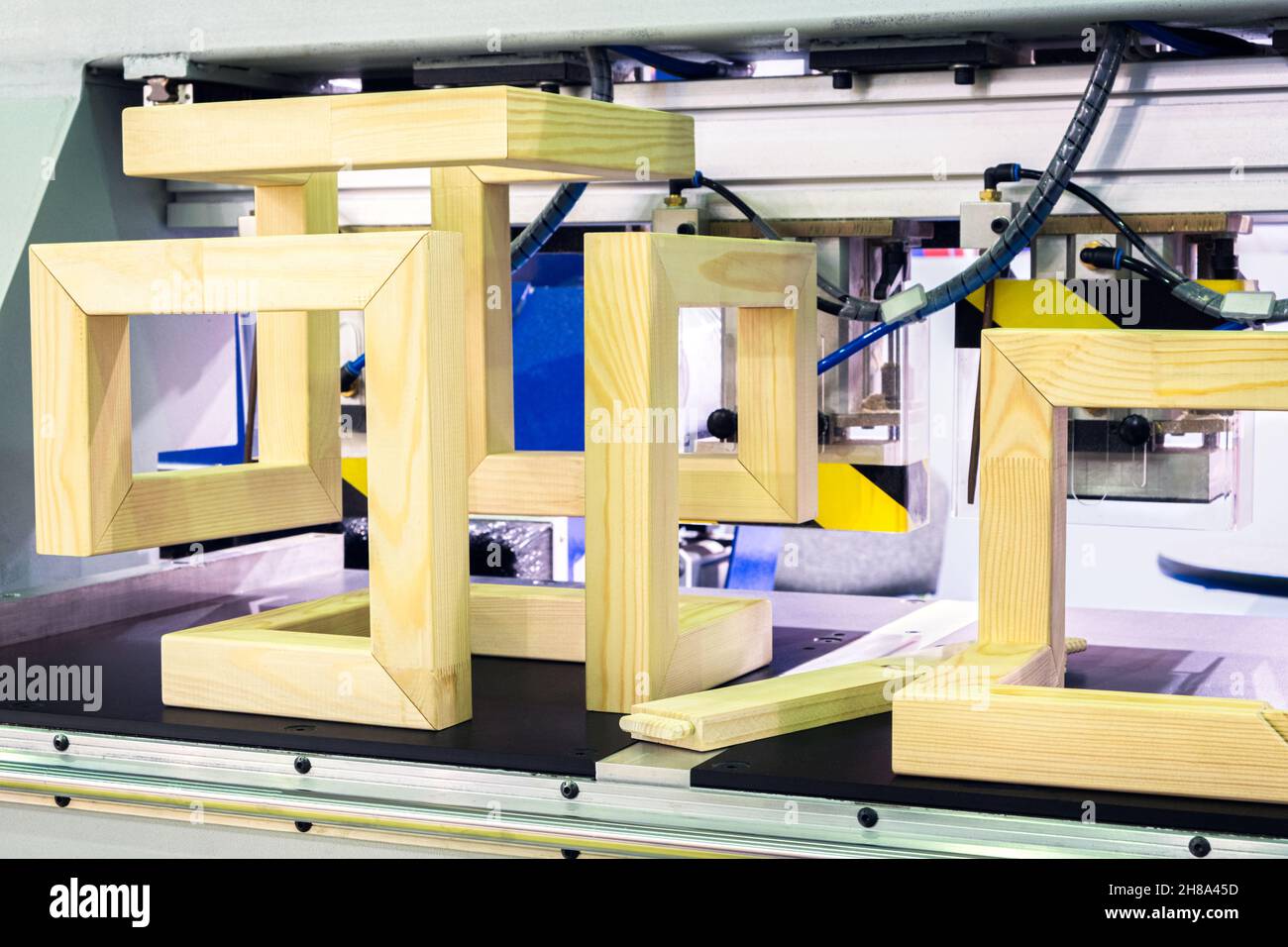 Machine tools format cutting are cut wooden furniture Stock Photo - Alamy