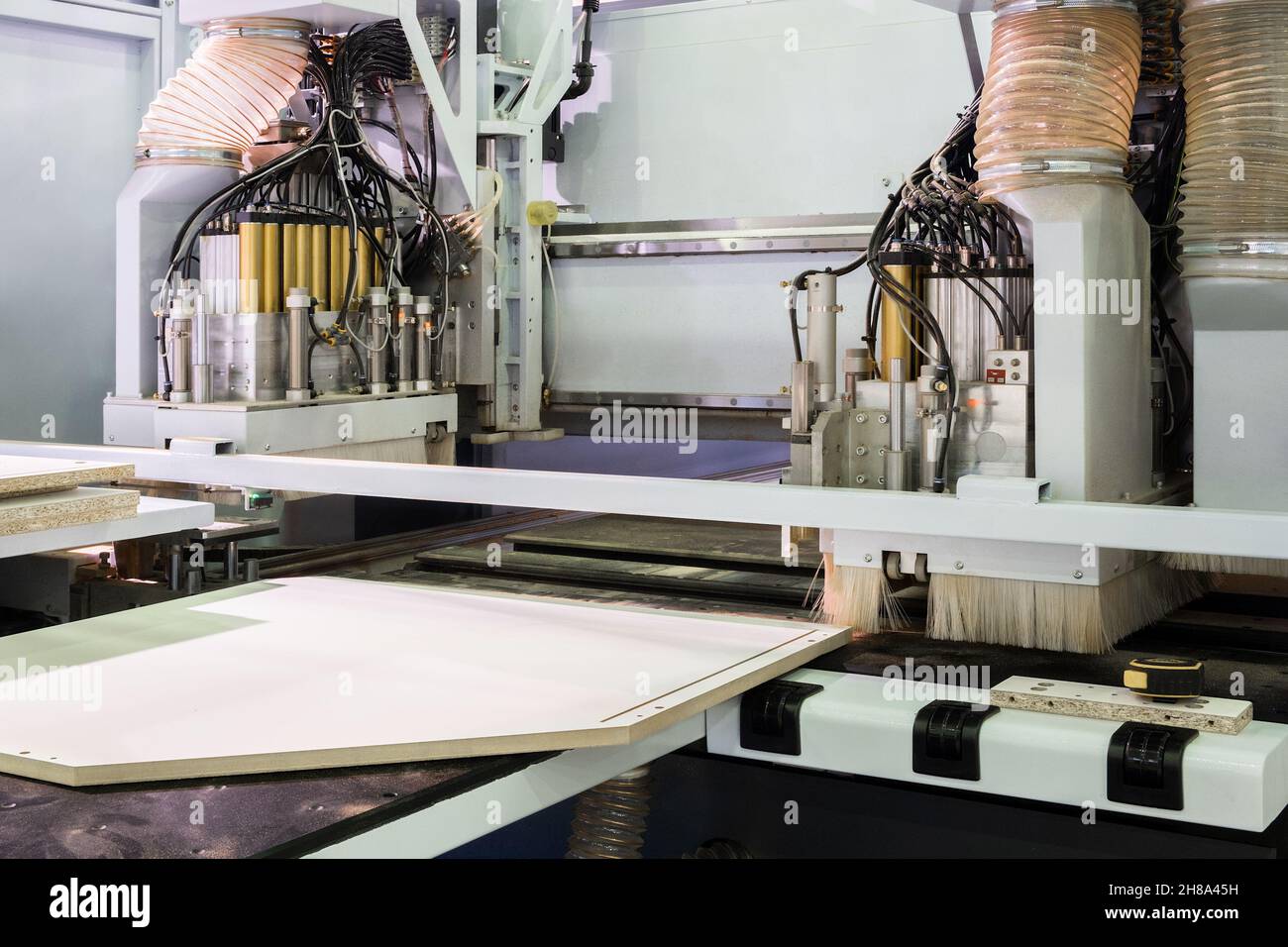 Machine tools format cutting are cut chipboard furniture Stock Photo ...