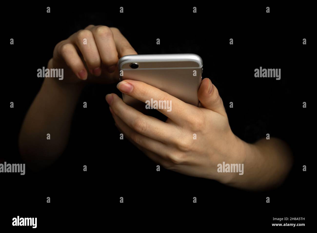 Person uses mobile phone with index finger. Hand with modern smartphone ...