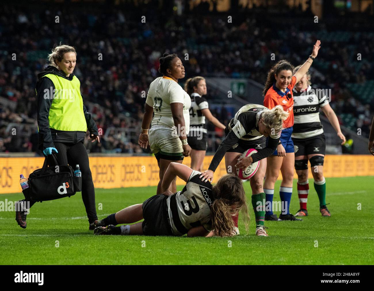 LONDON, ENGLAND - NOVEMBER 27: Barbarians’ Natasha Hunt checking on her ...