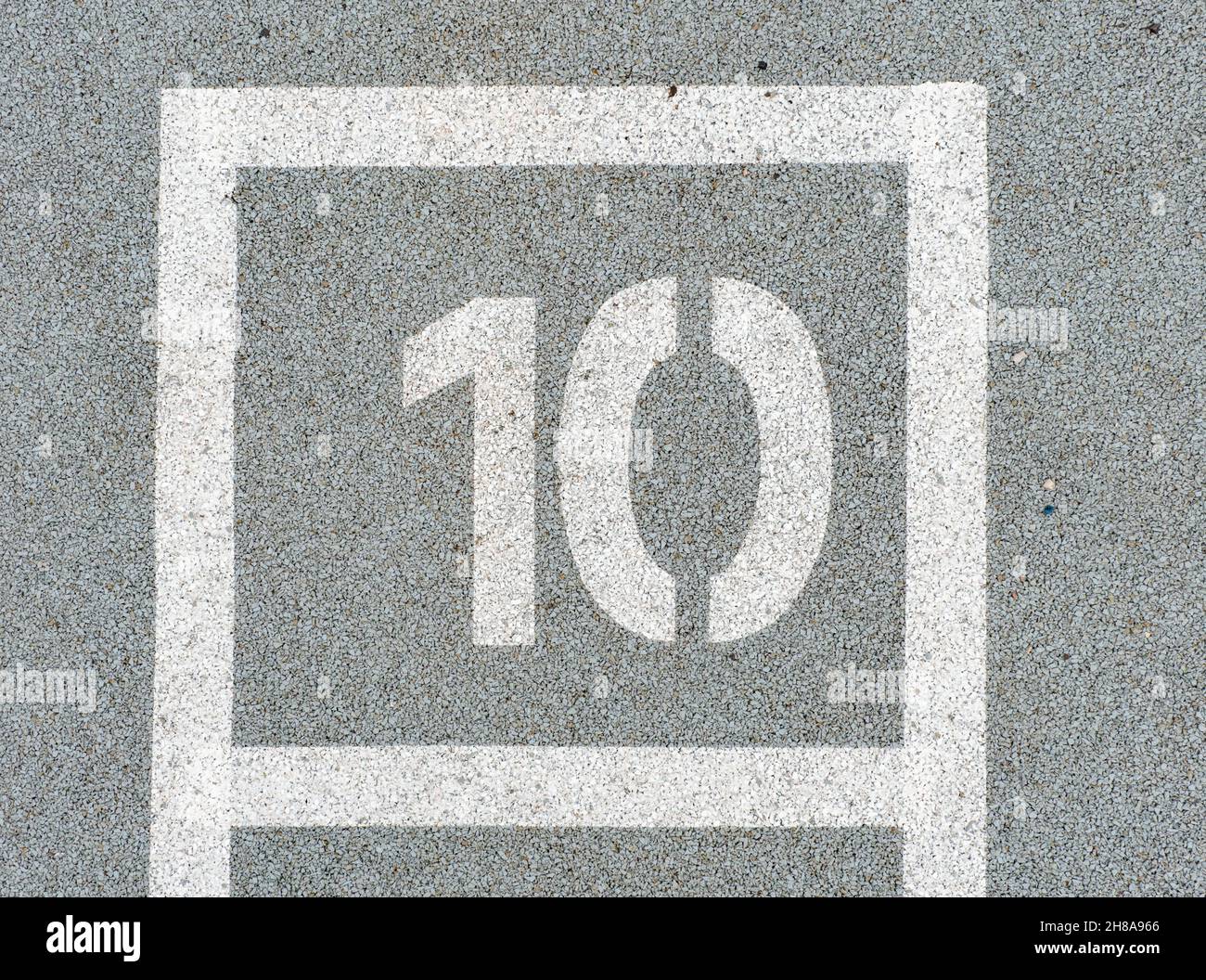 Number ten painted on soft rubber surface. The tenth place, Jumping ...