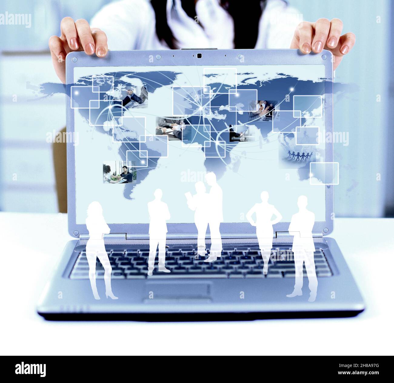 Laptop and business person against technology background Stock Photo ...