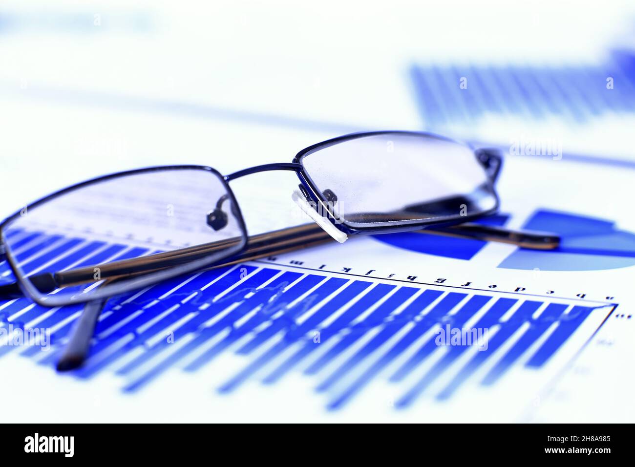 Stock market graphs analysis report Stock Photo - Alamy