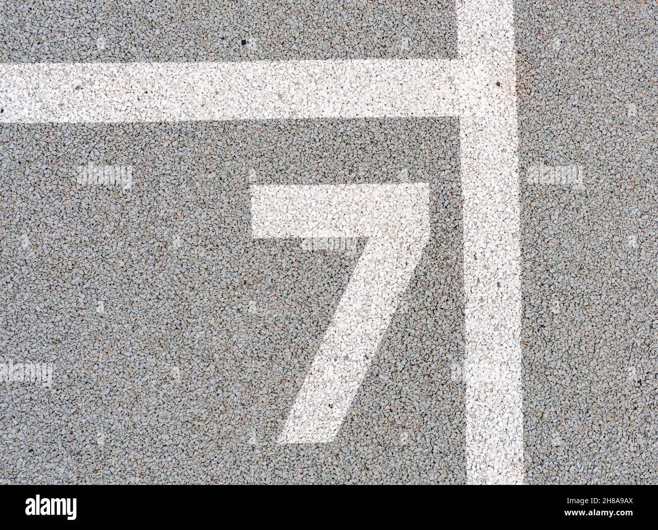 Number seven painted on soft rubber surface. Seventh possition. Jumping ...
