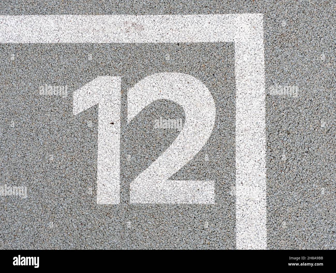 Number twelve painted on soft rubber surface. The twelfth point ...
